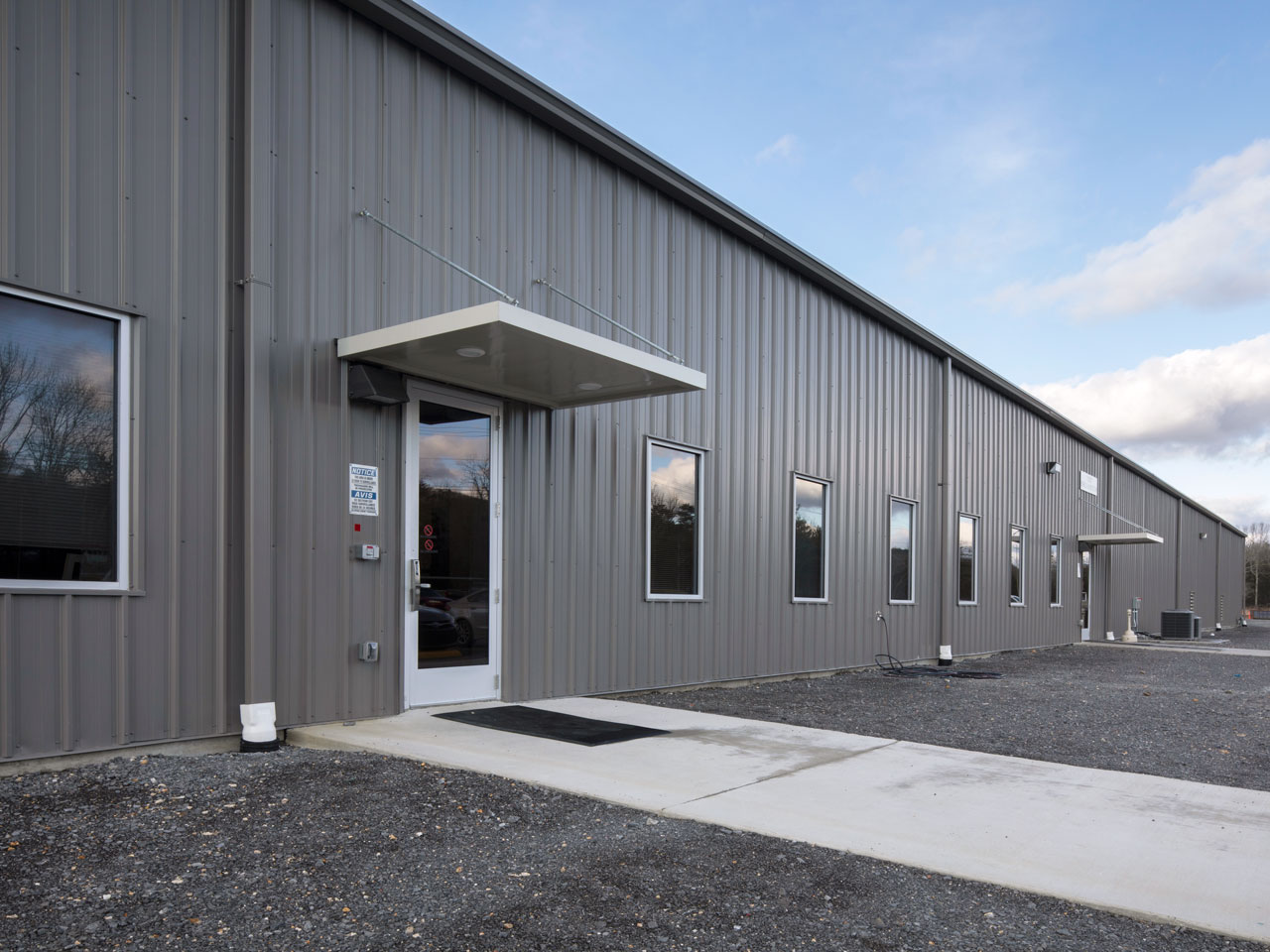 Dunn Building Company | EXPI-DOOR Systems Inc